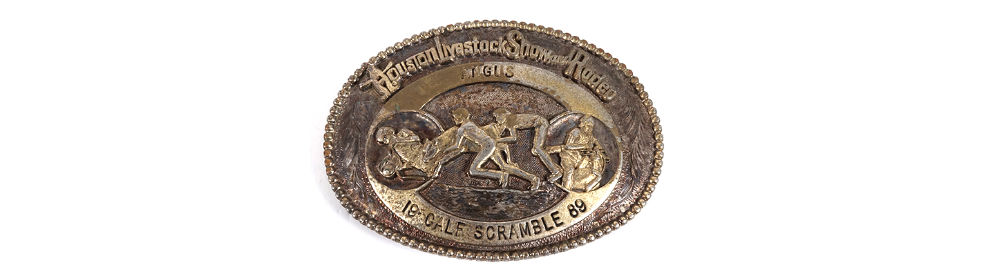 Calf Scramble Belt Buckle | Bullock Texas State History Museum